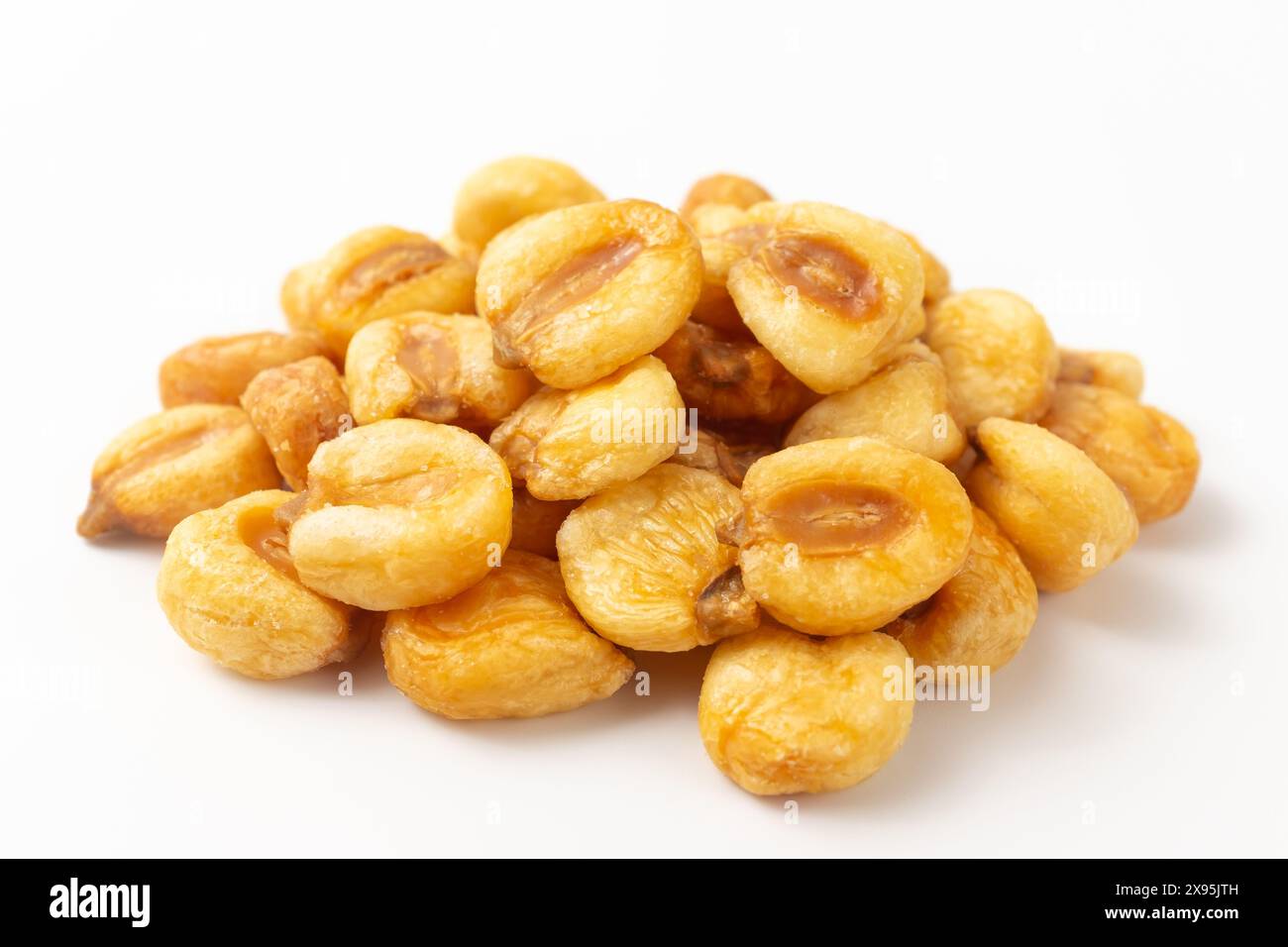 Roasted Inca cones on white background Stock Photo - Alamy