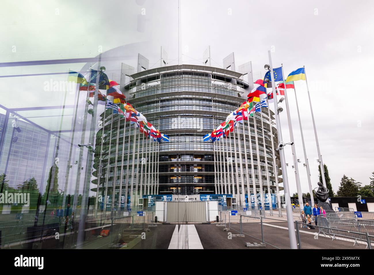 29 May 2024, France, Straßburg: The flags of the European Union, its ...