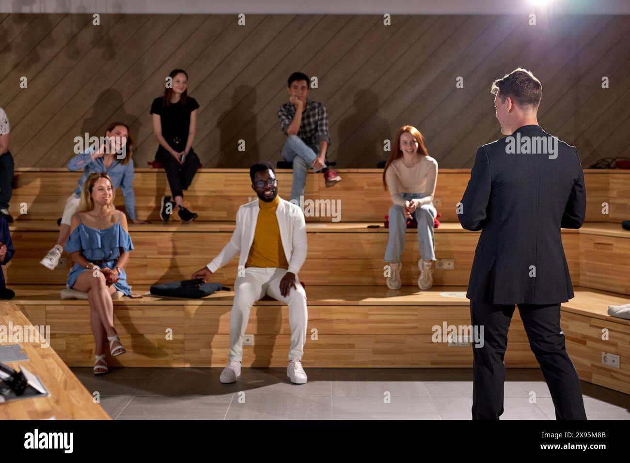 Speaker man in formal suit giving speech at Business Conference In ...