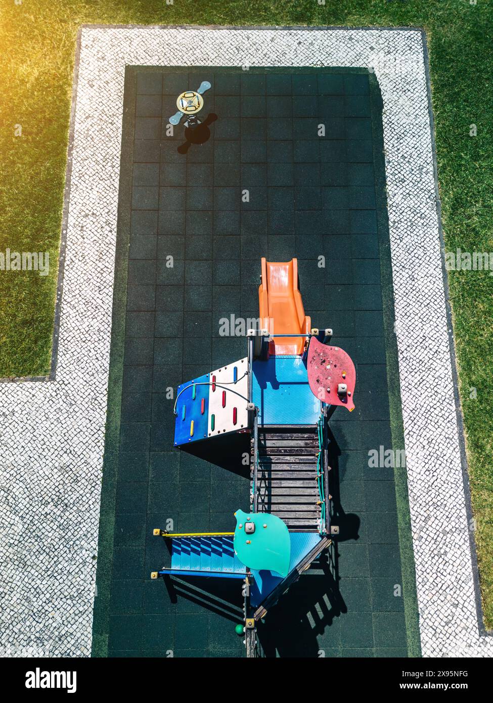 Aerial view of a vibrant playground with various recreational ...