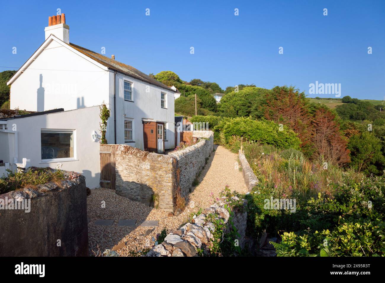 England, Devon, Torcross, Traditional Cottage built on Cliffs above the ...