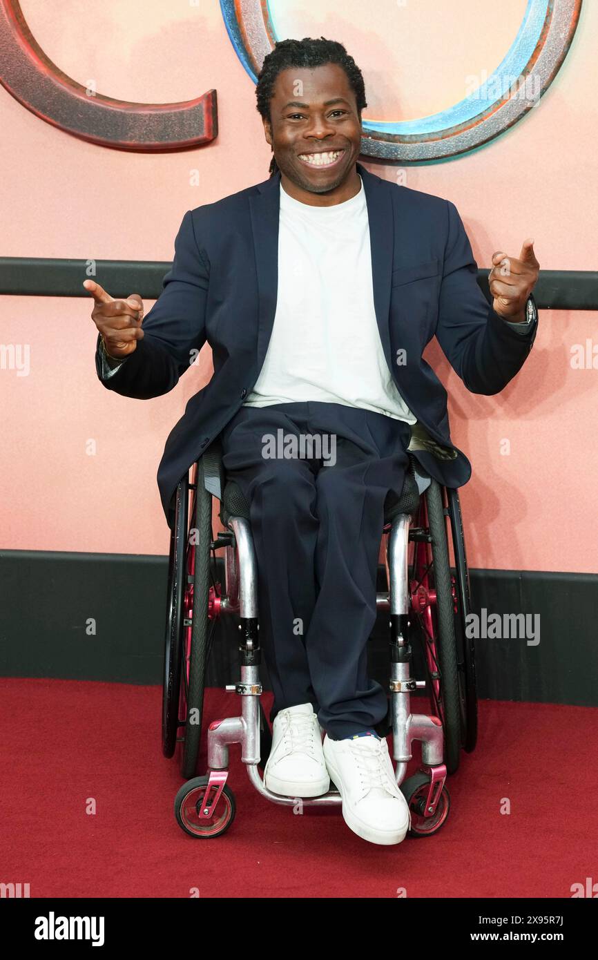 Ade Adepitan poses for photographers upon arrival at the UK Premiere of ...