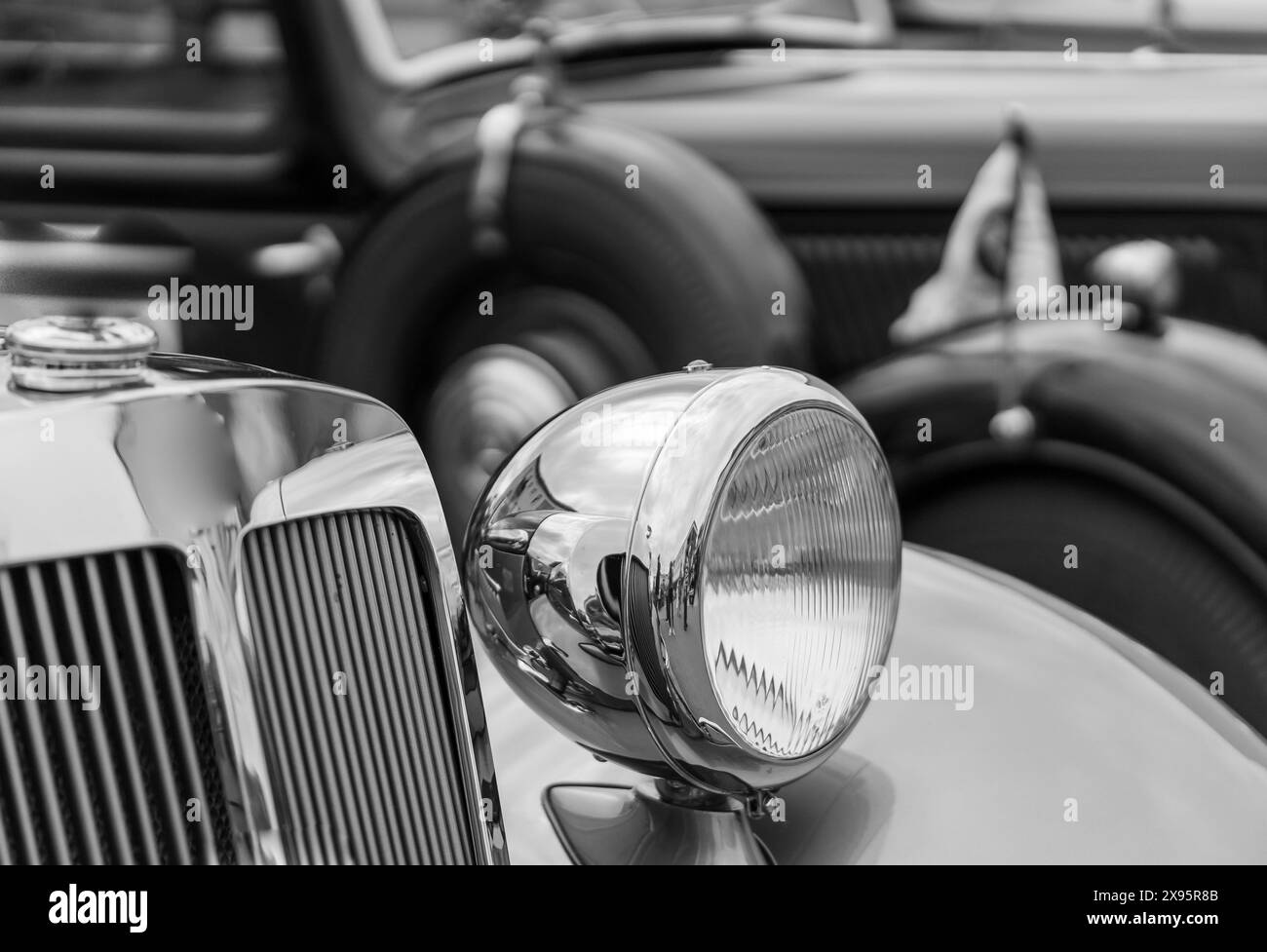old classic car headlight with chrome, black and white photography ...