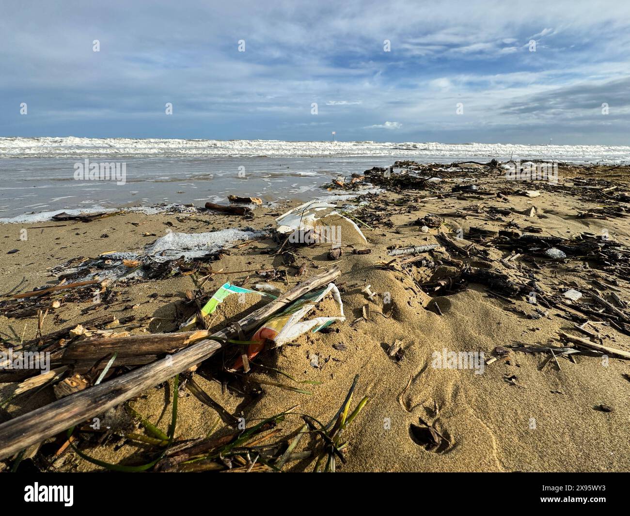 Lido di Jesolo, Italy - 2 May 2024: polluted beach by the sea after a ...