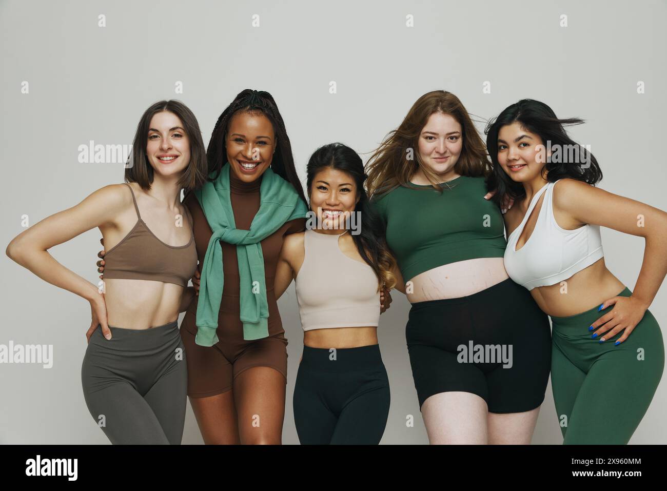 Group of five women, each with distinct body types and ethnicity, stand ...