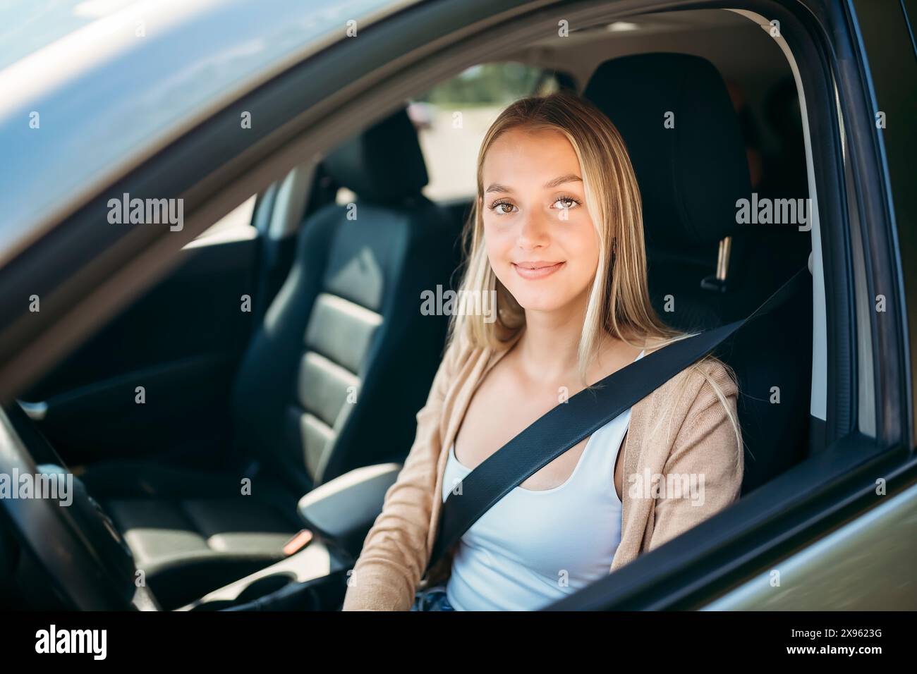 car driver woman happy owner of a new car Stock Photo - Alamy