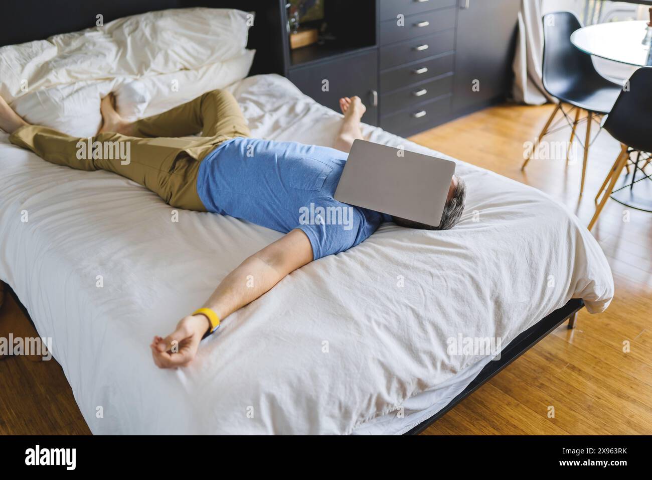 Sad man lay on bed hi-res stock photography and images - Alamy