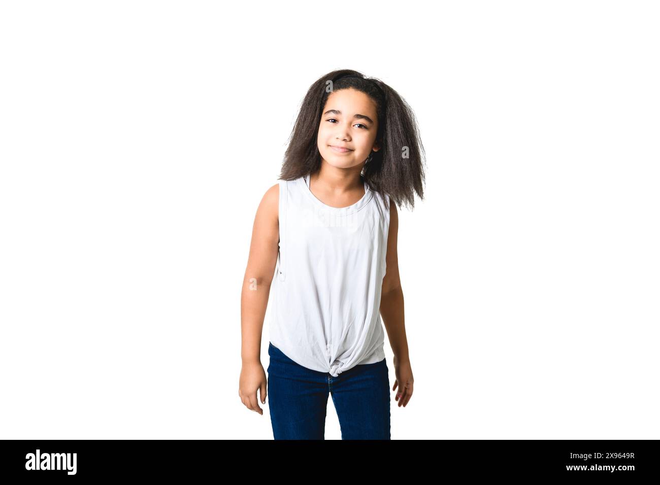 Adorable 9 years child girl on studio white background Stock Photo - Alamy