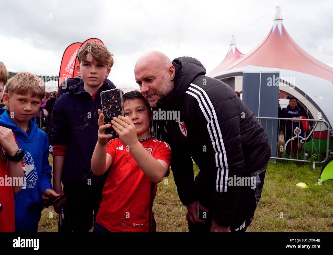 Wales manager Rob Page meets fans during a squad announcement at the ...