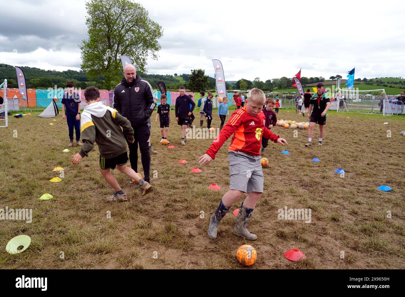 Wales manager Rob Page during a football training session with children ...