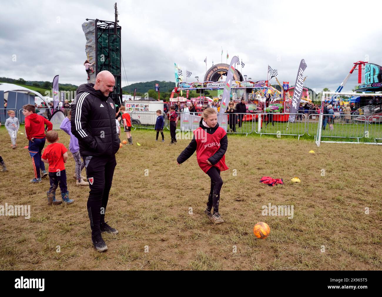 Wales manager Rob Page during a football training session with children ...