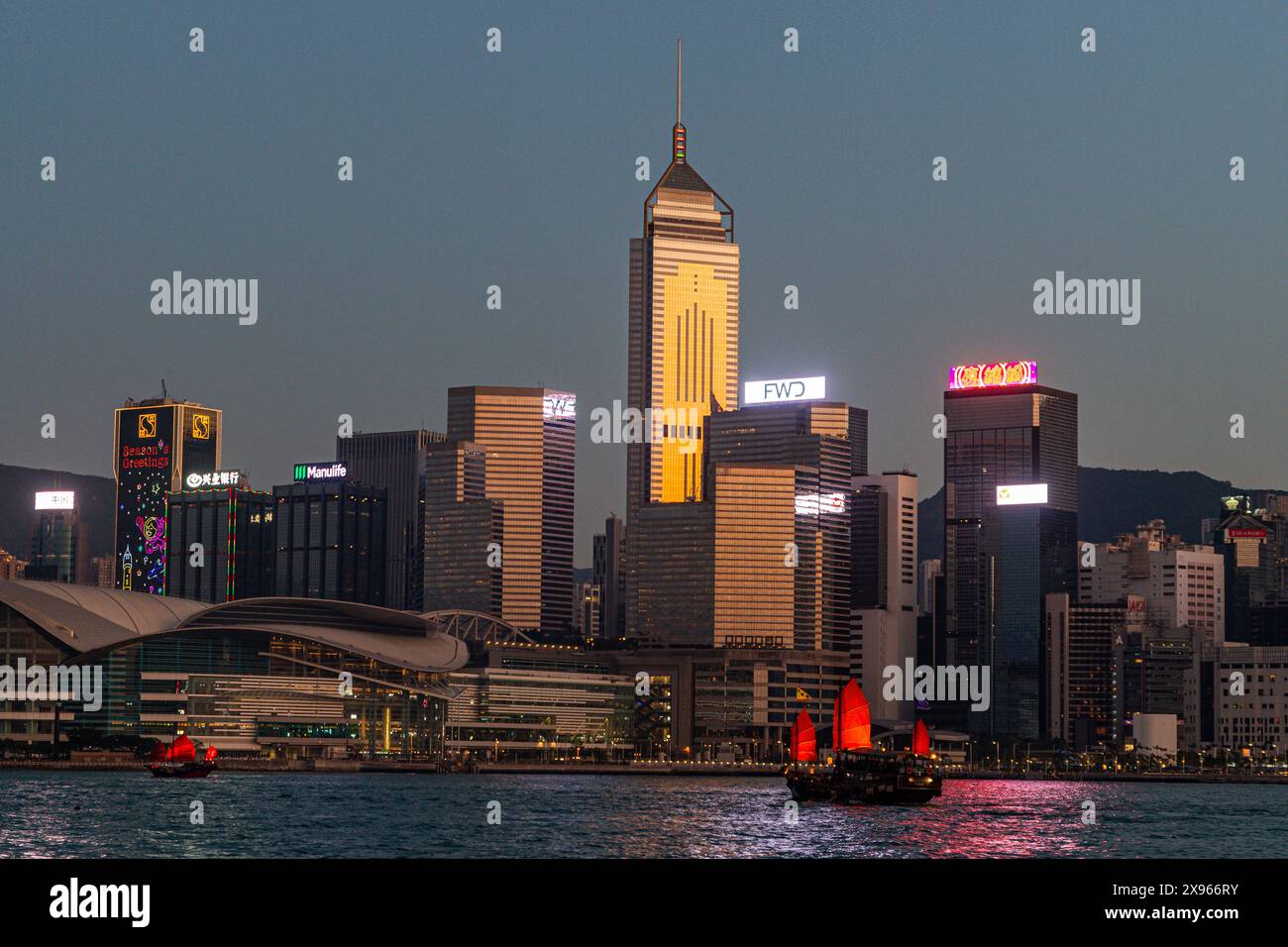 Traditional sailing boat in front of high rise buildings in Central ...