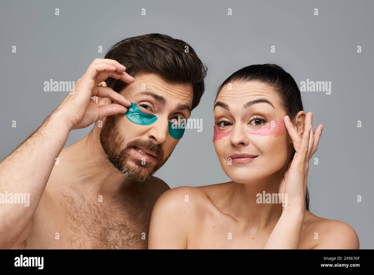 Beautiful couple, with eye patches, pose together in an enchanting ...