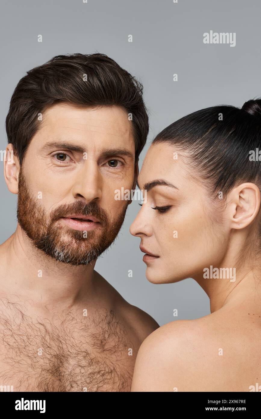 A man and woman pose gracefully together Stock Photo - Alamy