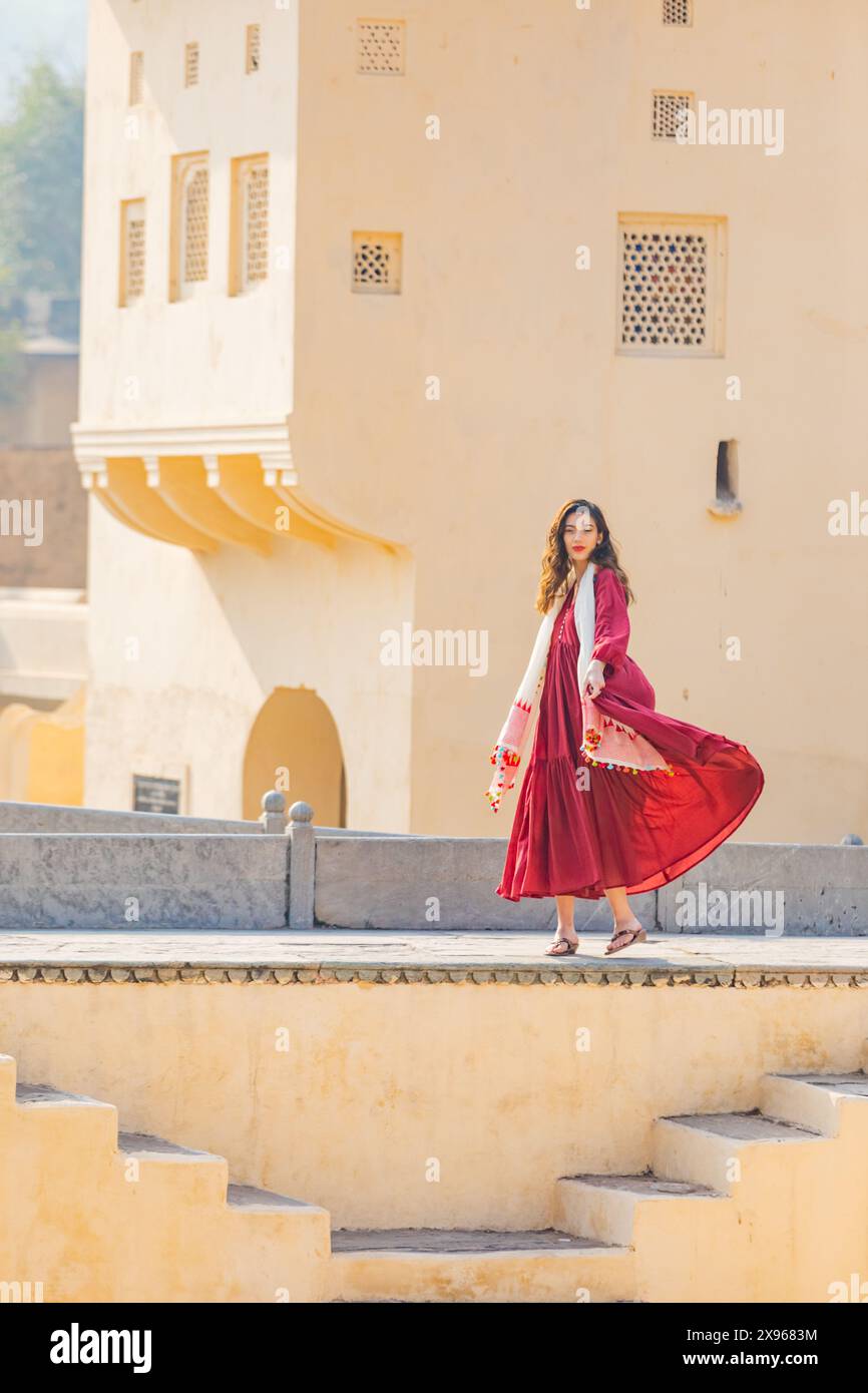 Woman in red garment at Panna Meena ka Kund, Jaipur, Rajasthan, India ...