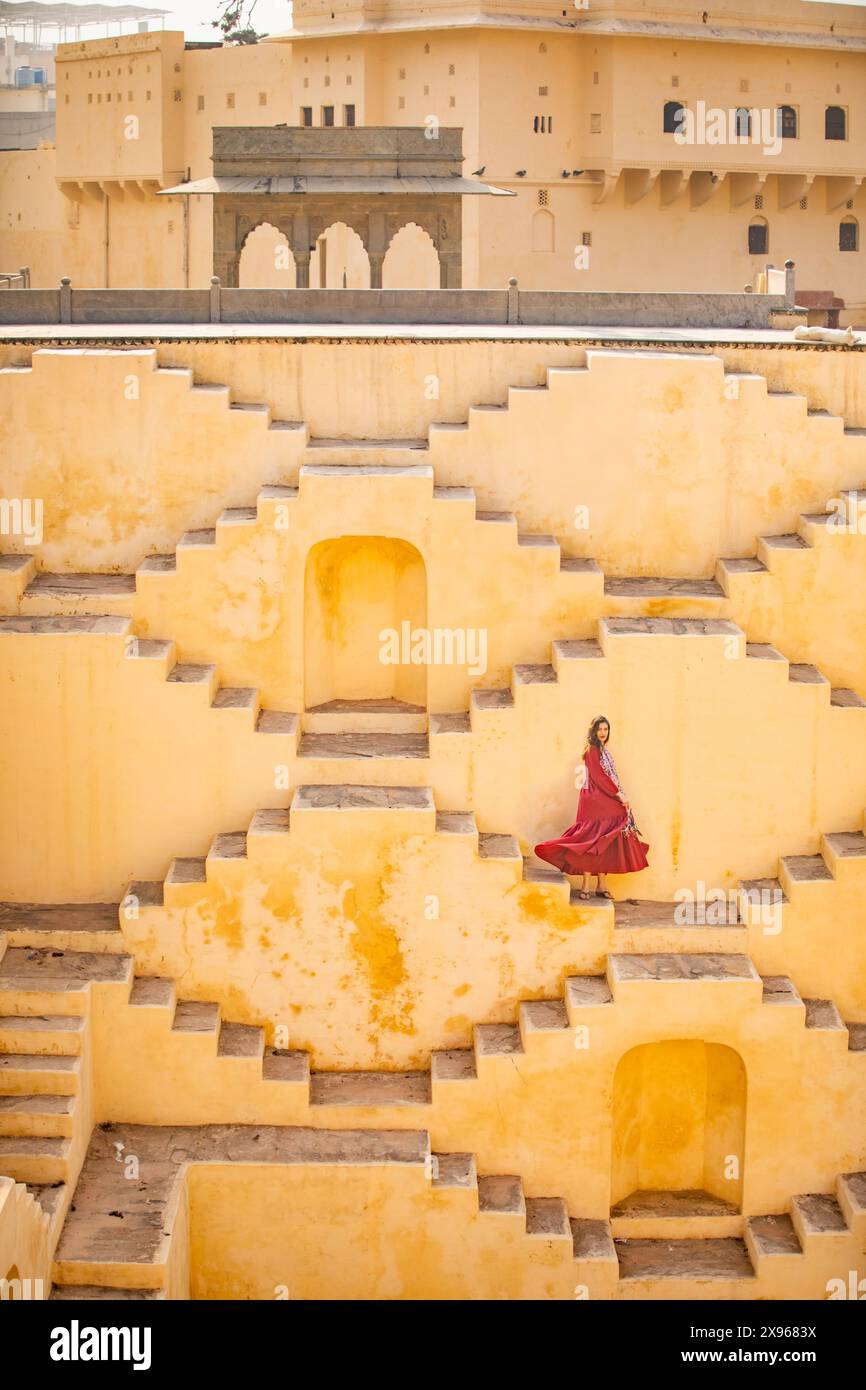 Woman in red garment at Panna Meena ka Kund, Jaipur, Rajasthan, India ...