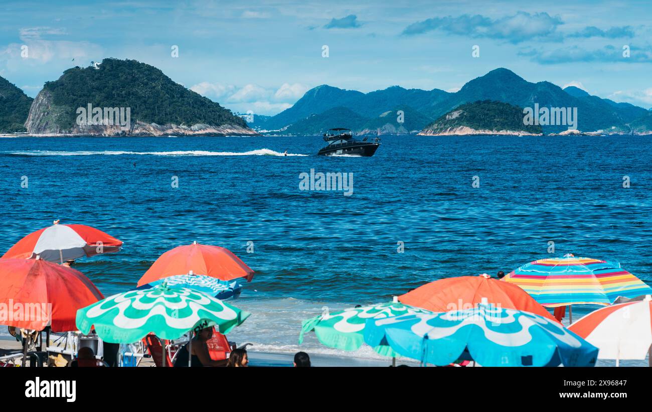 A man on a jet-ski overlooking Copacabana Beach, Rio de Janeiro, Brazil ...