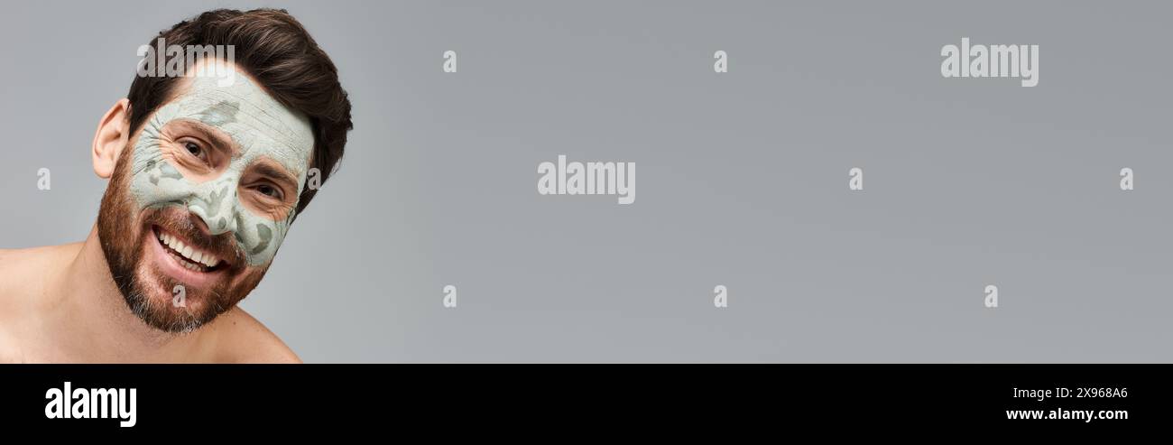 A man wearing a facial mask for skincare Stock Photo - Alamy