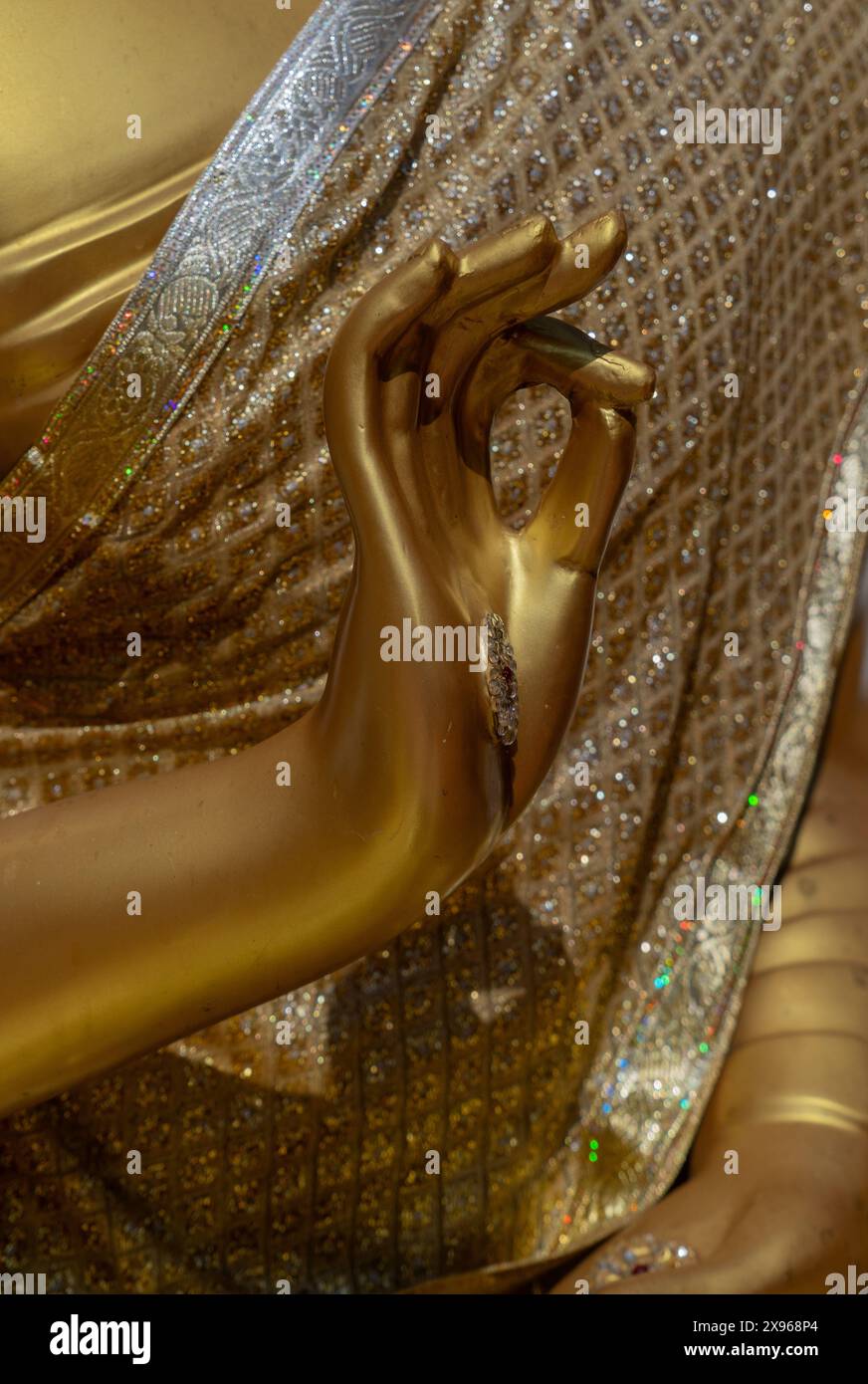Golden hand detail at Wat Suthep (Wat Phra That Doi Suthep), historical ...