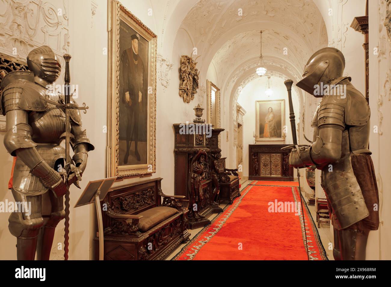 Interior decoration with Medieval steel knights' armour in a corridor ...