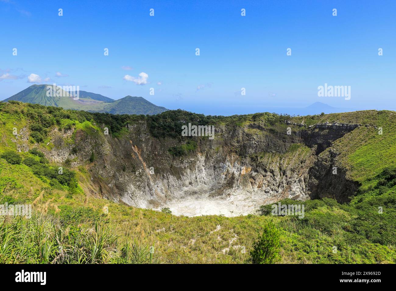 Mount Mahawu, a stratovolcano and active 180m wide crater, with Lokon ...