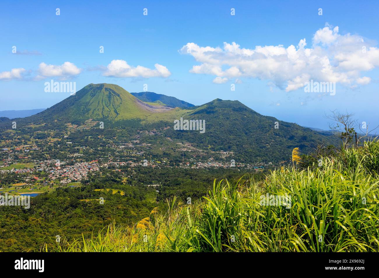 Mounts Lokon on the left, and Empung, with Tompaluan active crater on ...