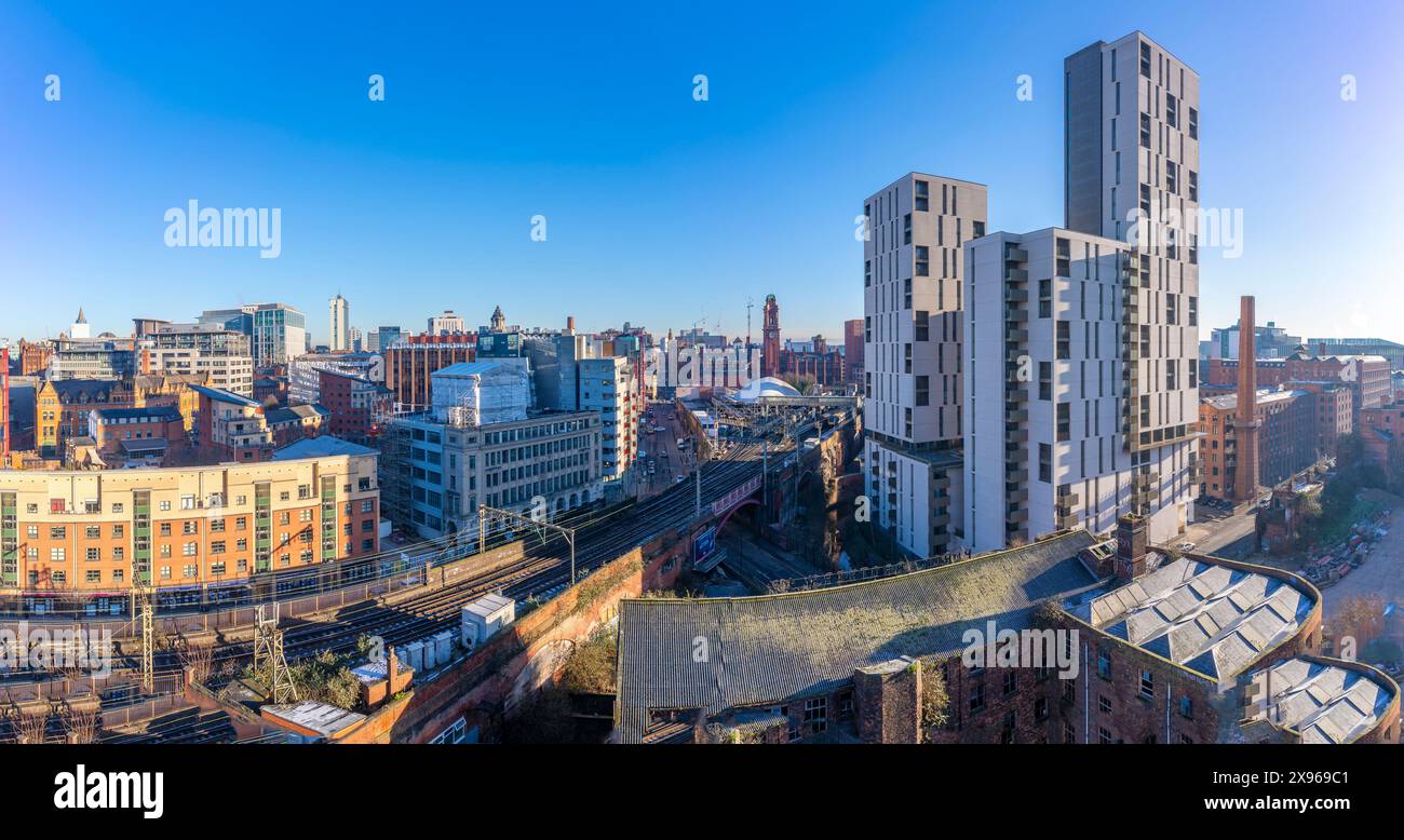 Elevated view of city skyline from Tony Wilson Place, Manchester ...