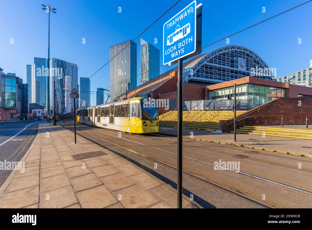 View of apartment buildings, city tram and Manchester Central ...