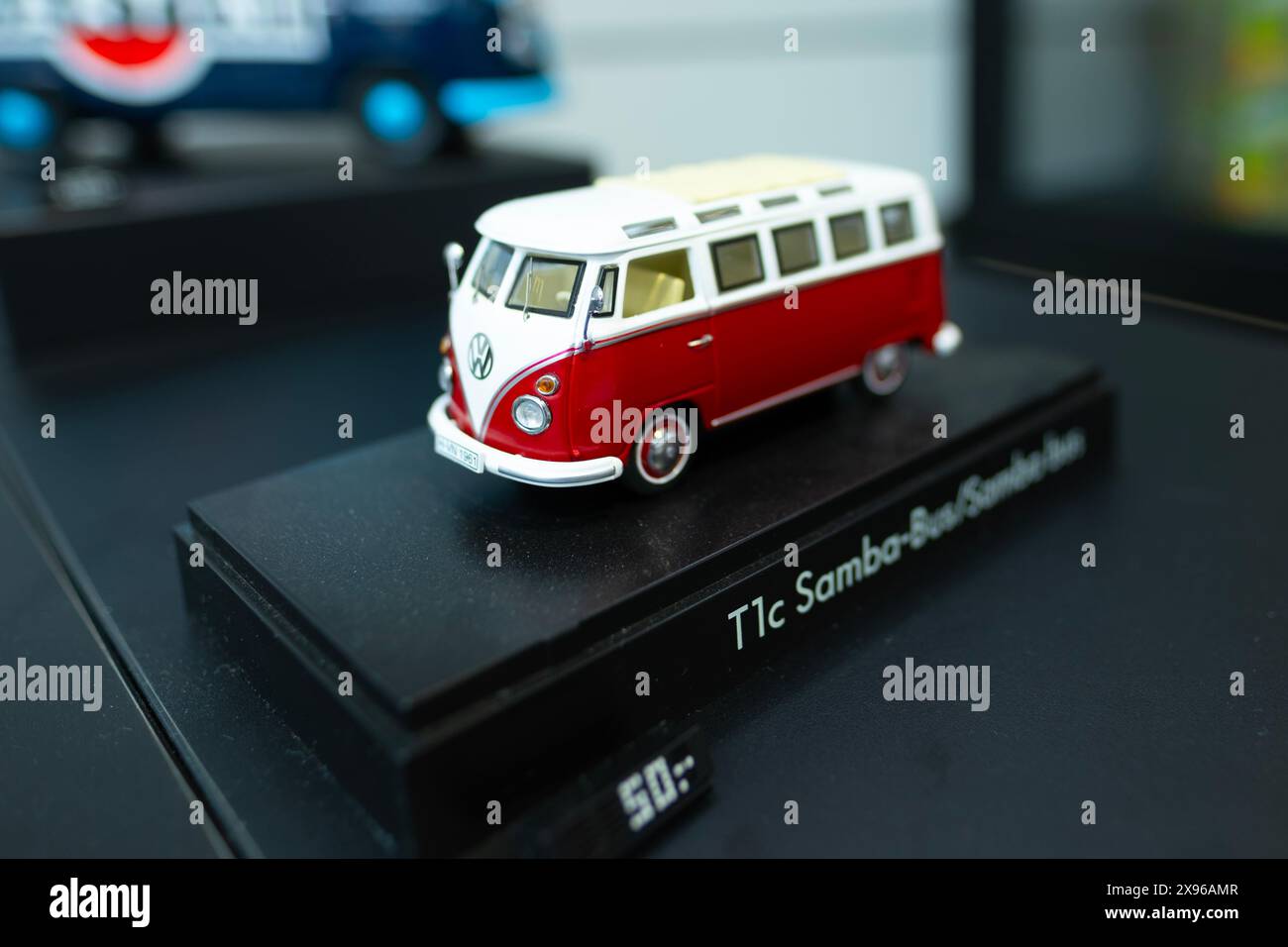 classic vintage red and white Volkswagen bus model, automotive pop ...