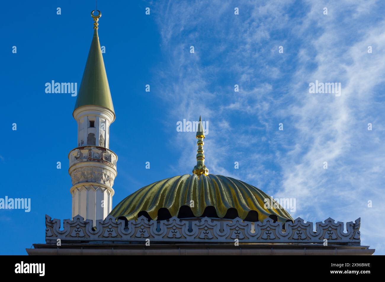 Stylized minaret and gilded dome on the Turkish Bath building ...