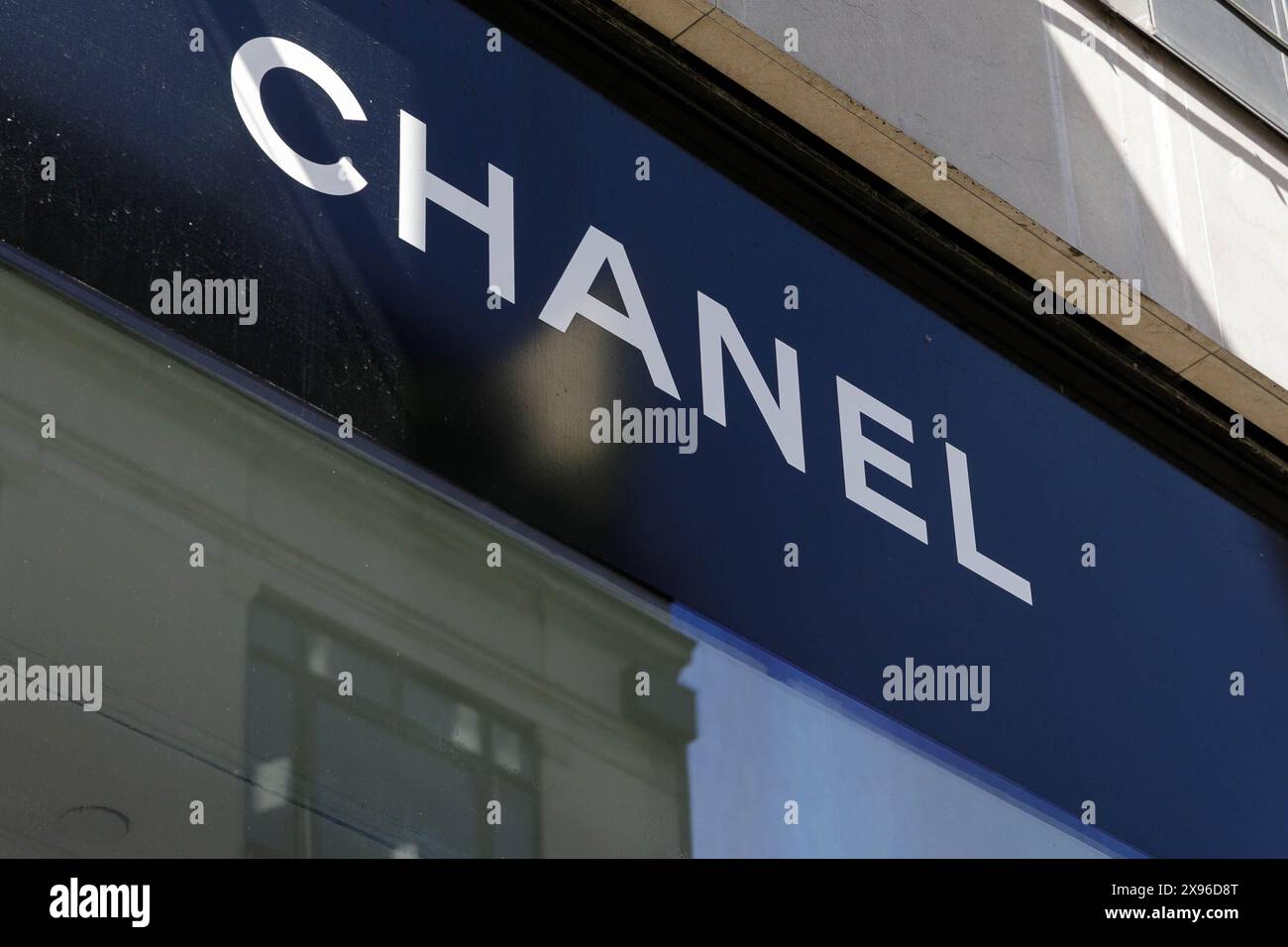The Chanel logo is visible on the store, located in the center of ...