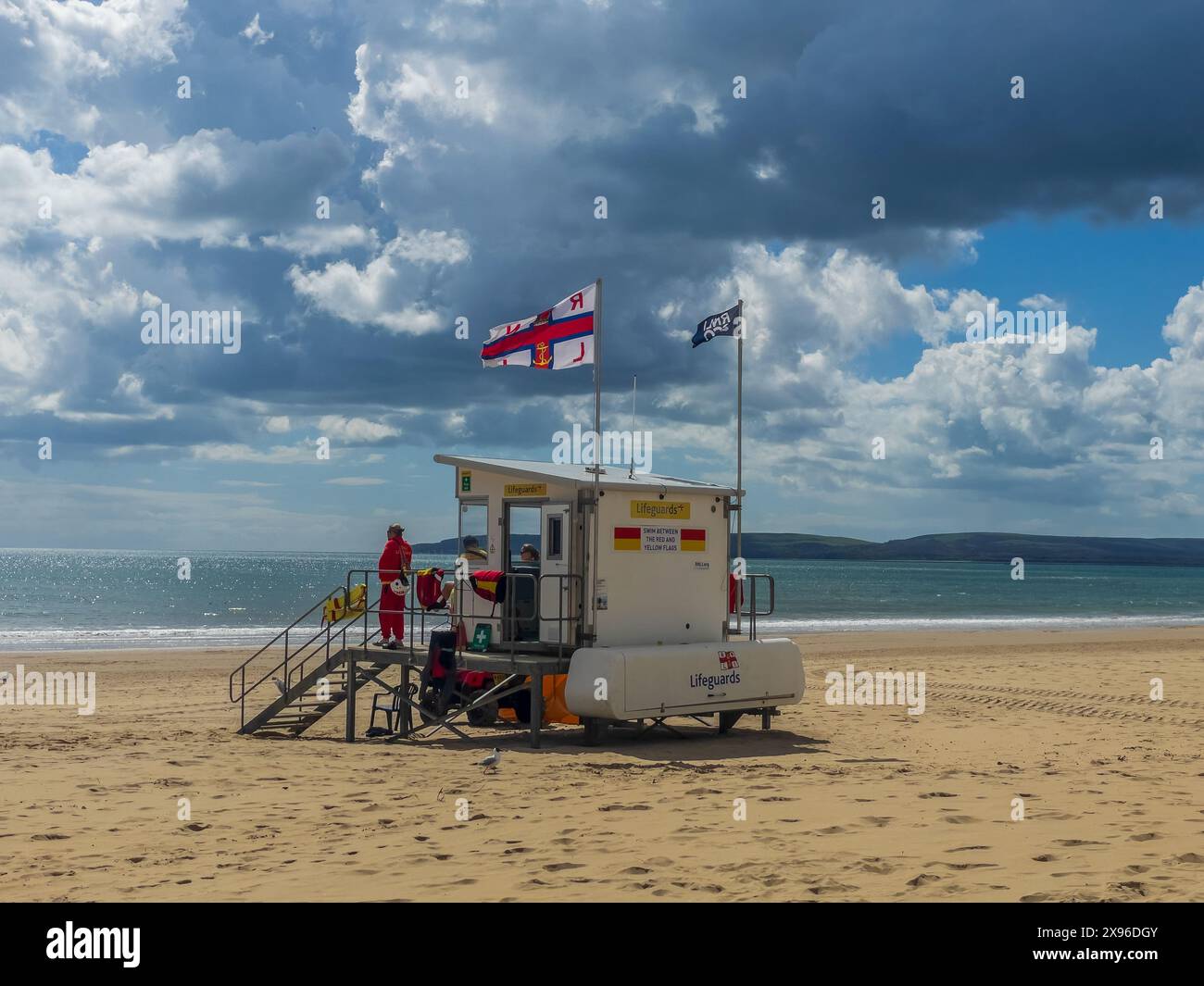 West Cliff Beach, Bournemouth, UK - April 12th 2024: Flags waving in ...