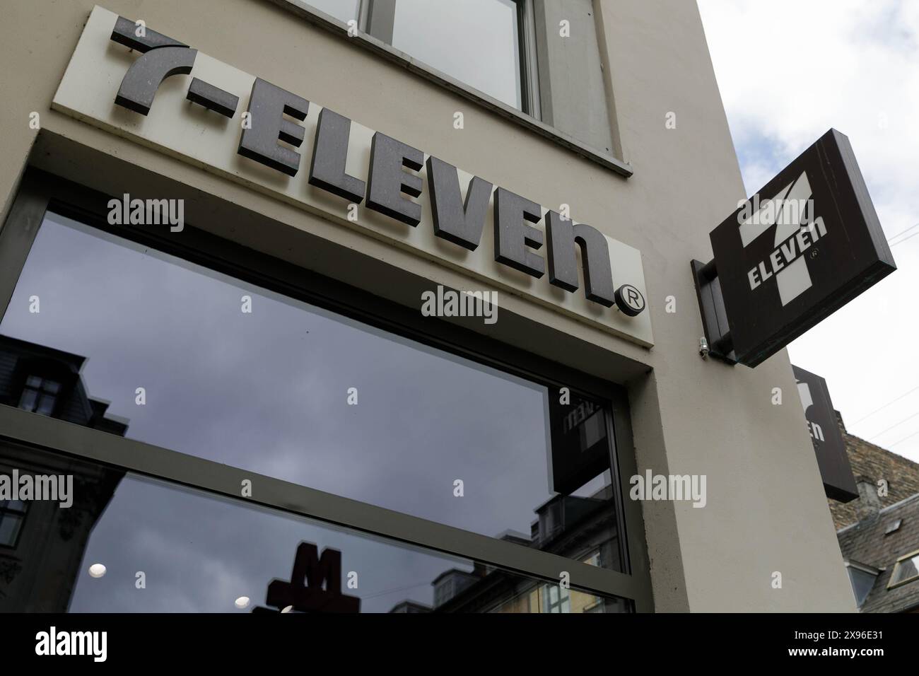 The 7-Eleven logo is visible on the store, located in the center of ...