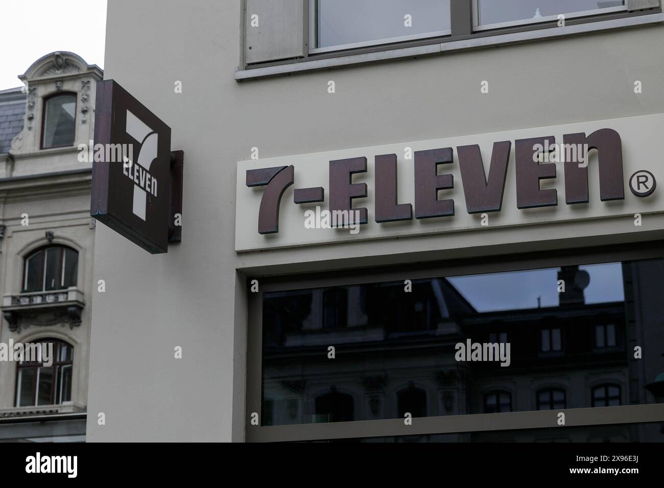 The 7-Eleven logo is visible on the store, located in the center of ...