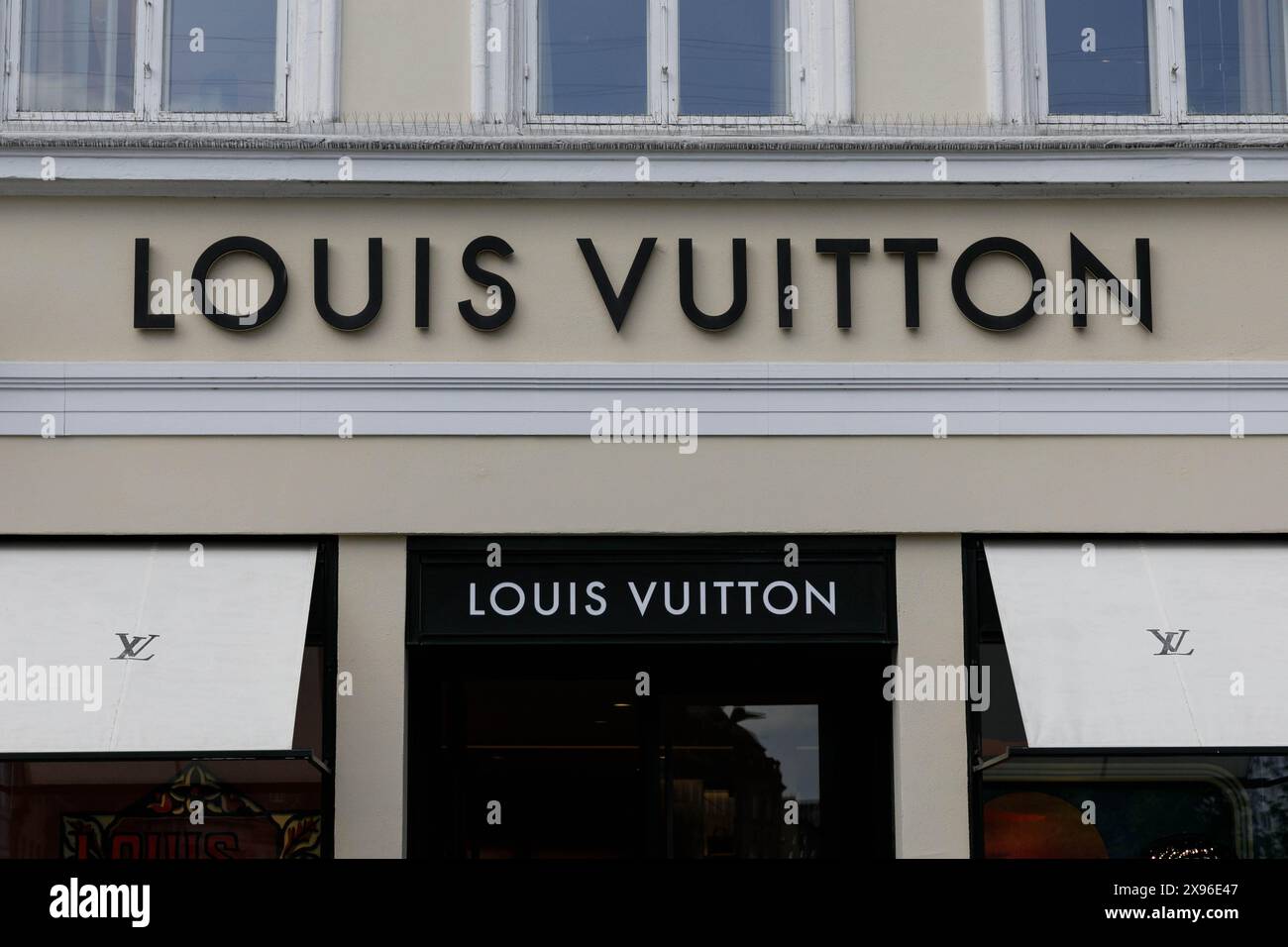 The Louis Vuitton logo is visible on the store, located in the center ...
