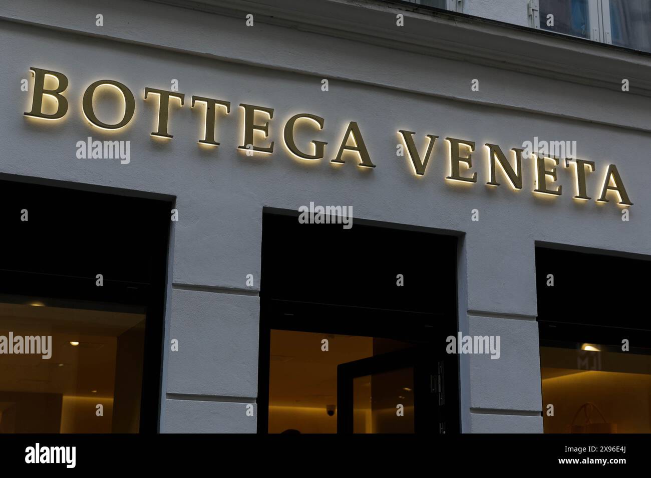 The Bottega Veneta logo is visible on the store, located in the center ...