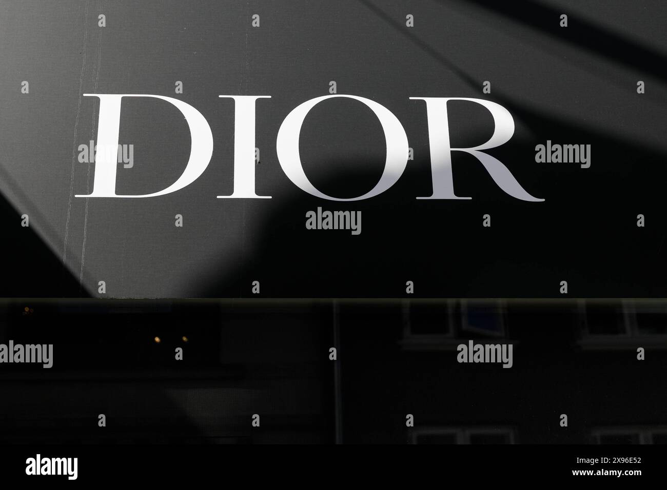 The Dior logo is visible on the store, located in the center of ...