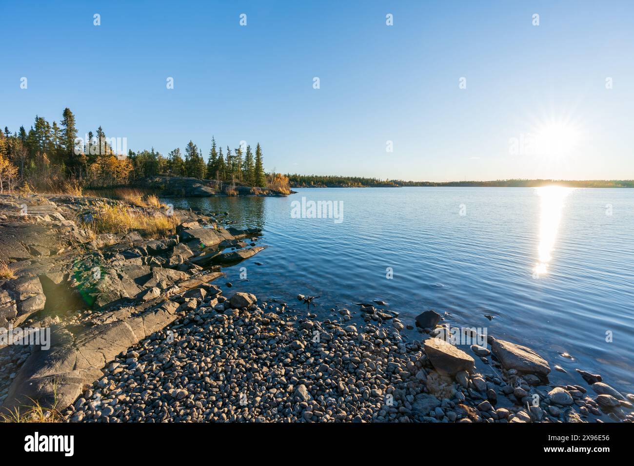 Frame Lake shore at sunset time, clear sky and sunlight. Yellowknife ...