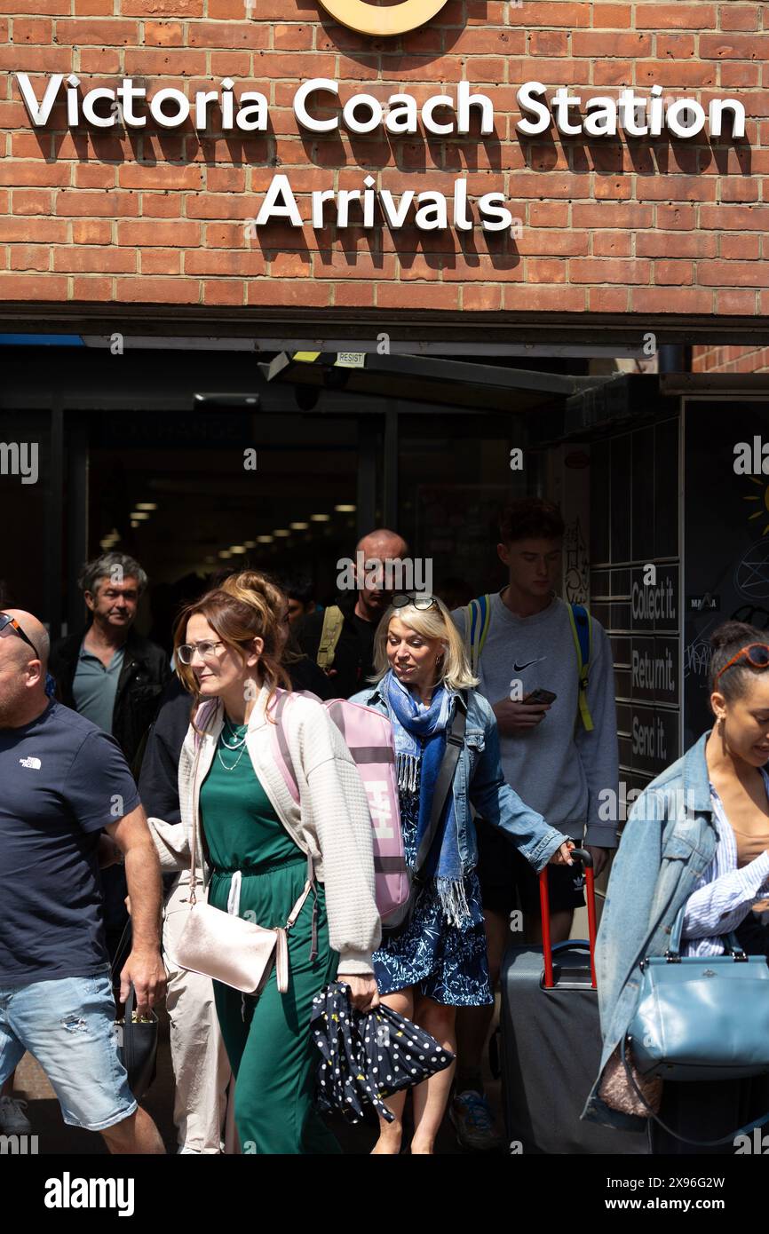 People arrive at Victoria Coach Station in London as rail passengers ...