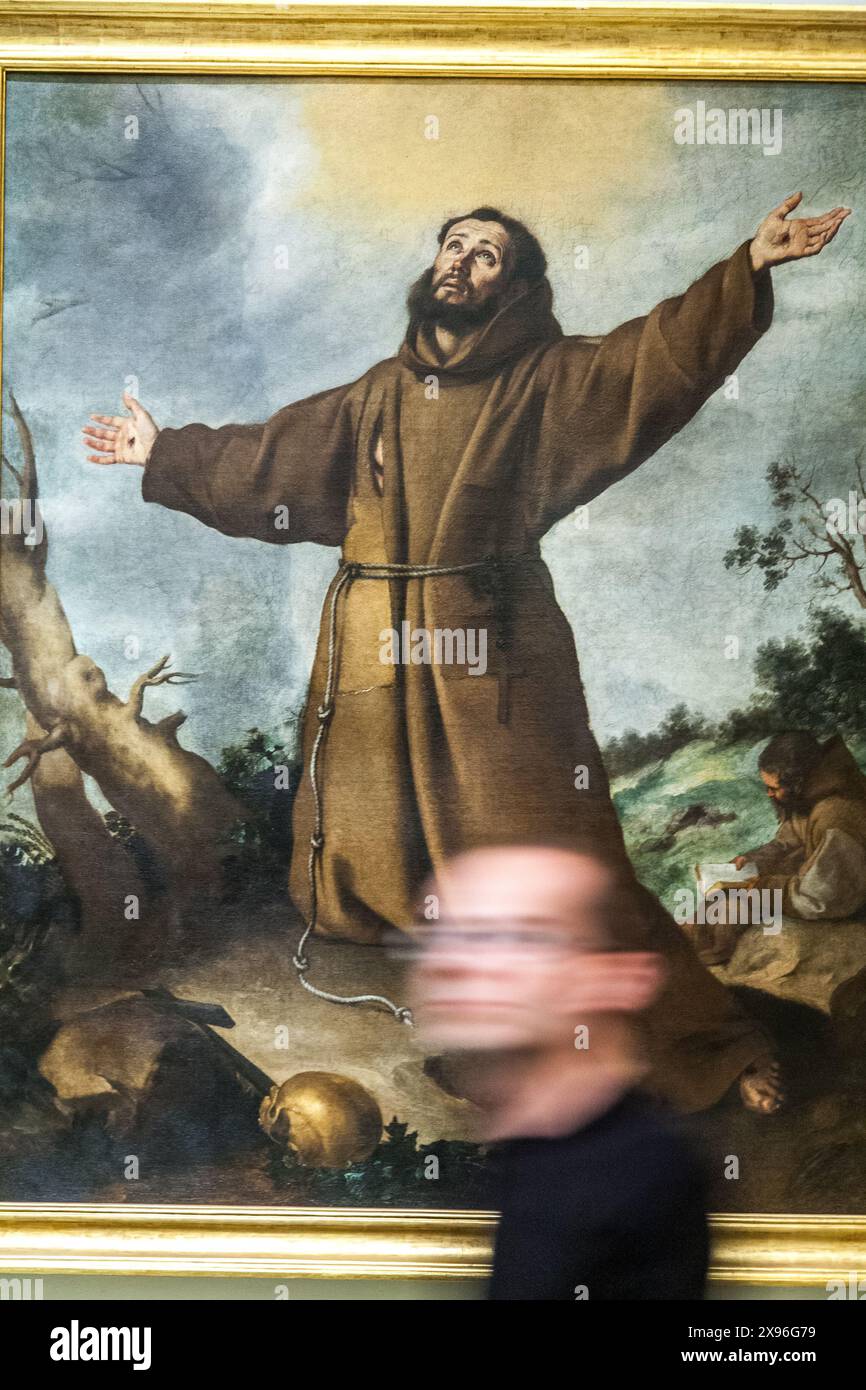 A visitor in front of Saint Francis painting by Murillo (around 1650 ...