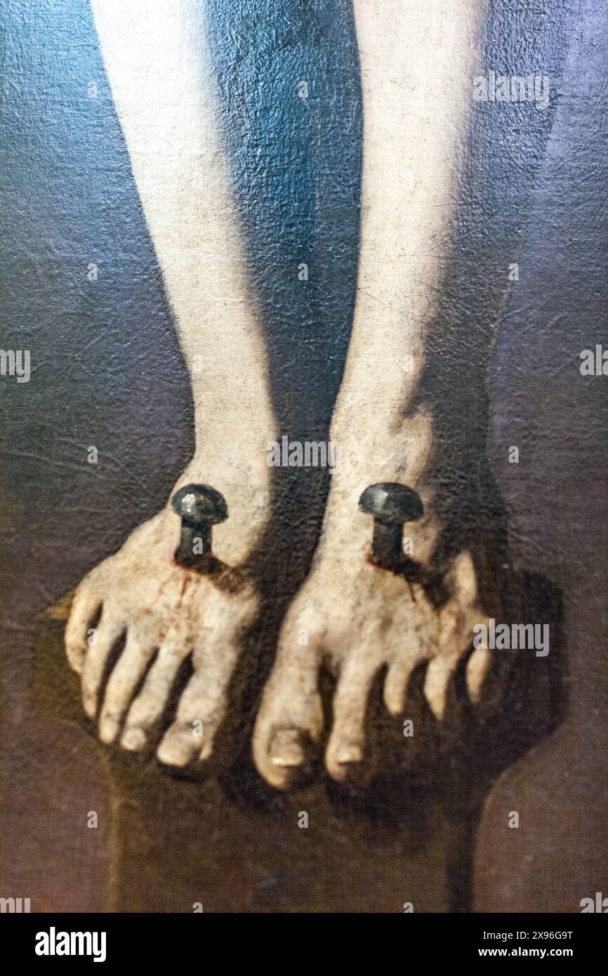 Detail showing nailed feet of Dying Christ from a 17th-century painting ...