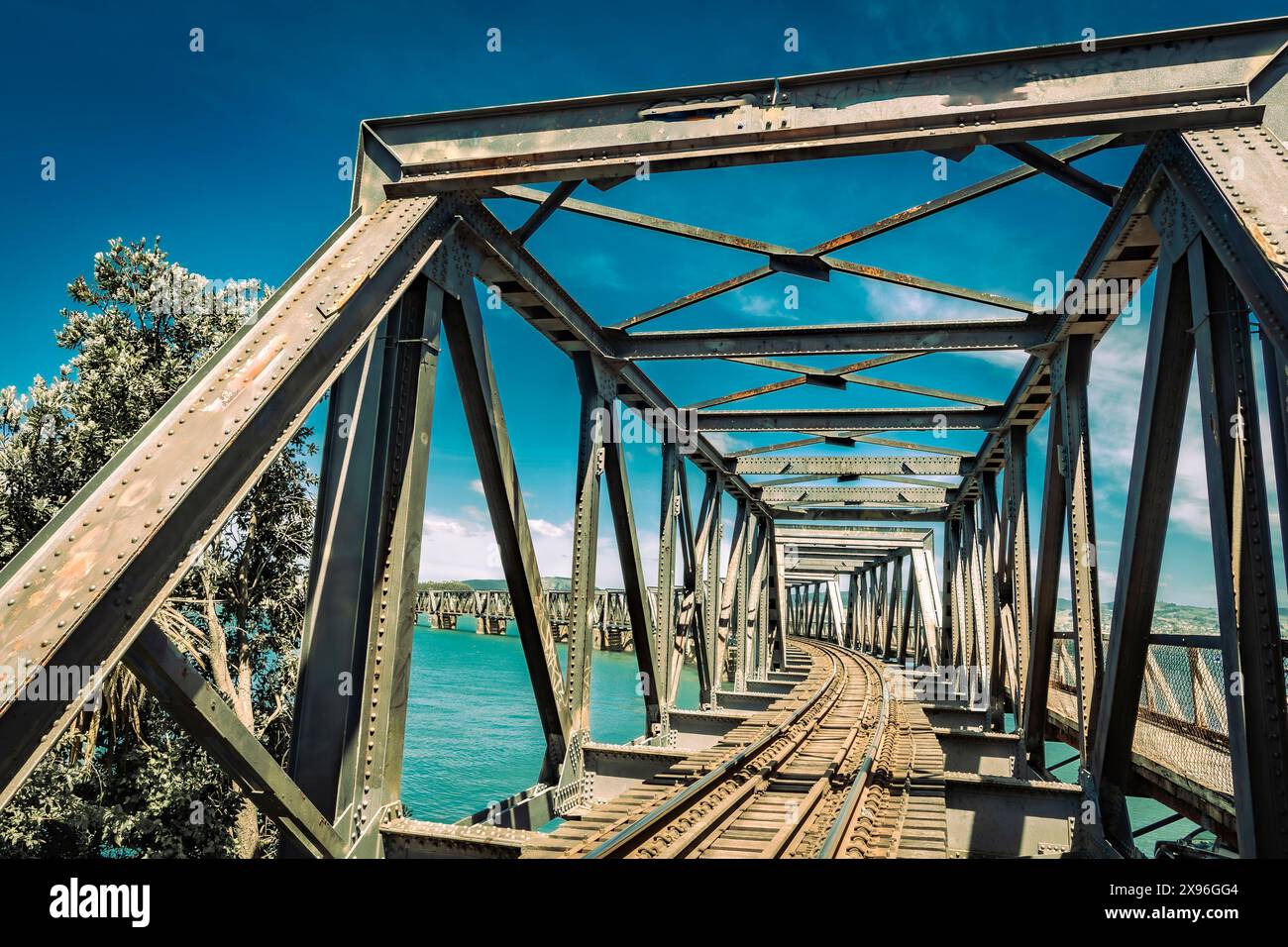 Historic old railway bridge structure aged image effect with curving ...