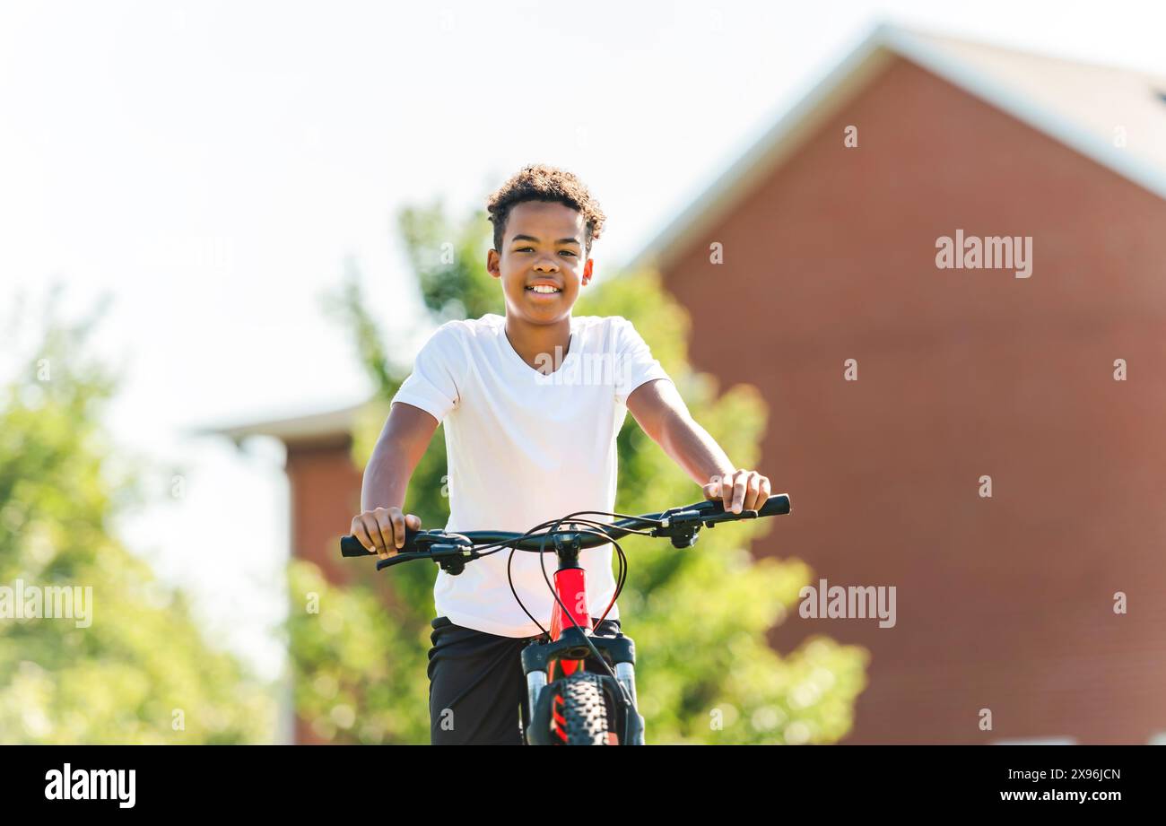boy riding bike outside in summer season Stock Photo - Alamy