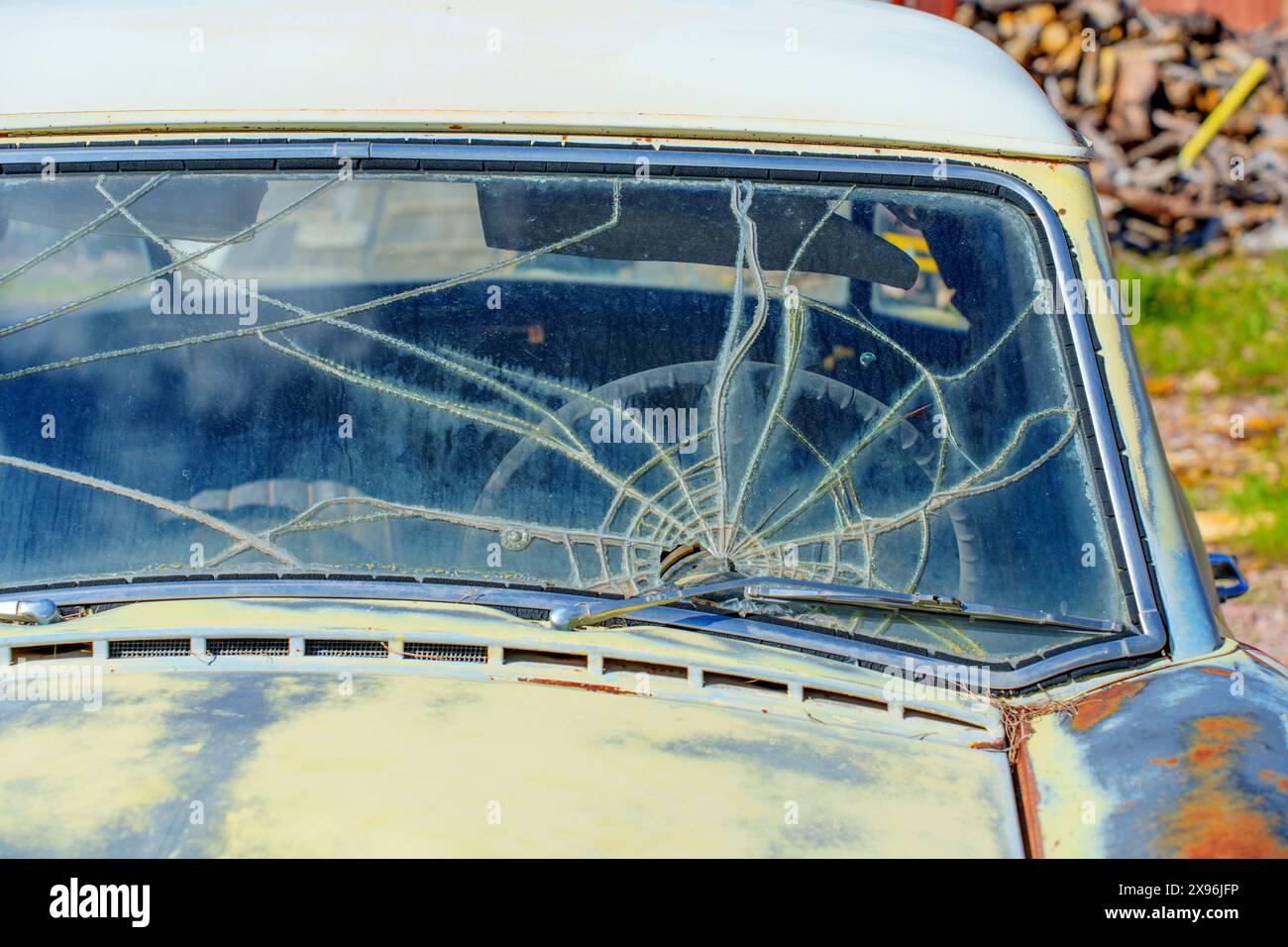 Top front section view of a weathered vintage car, focusing on the car ...