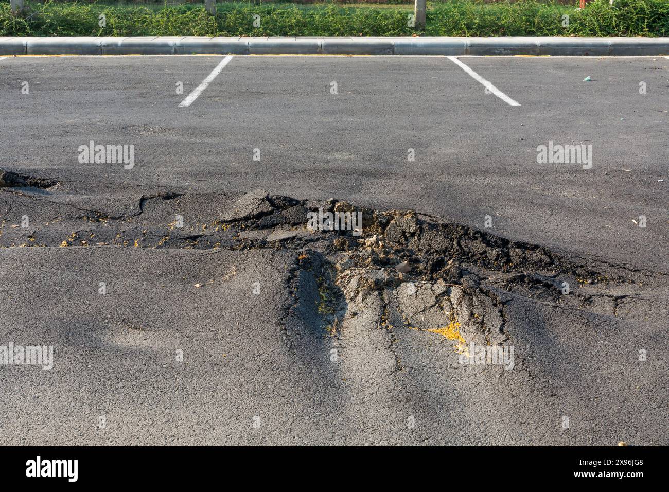 Asphalt surface on the street was demolished due to poor construction ...