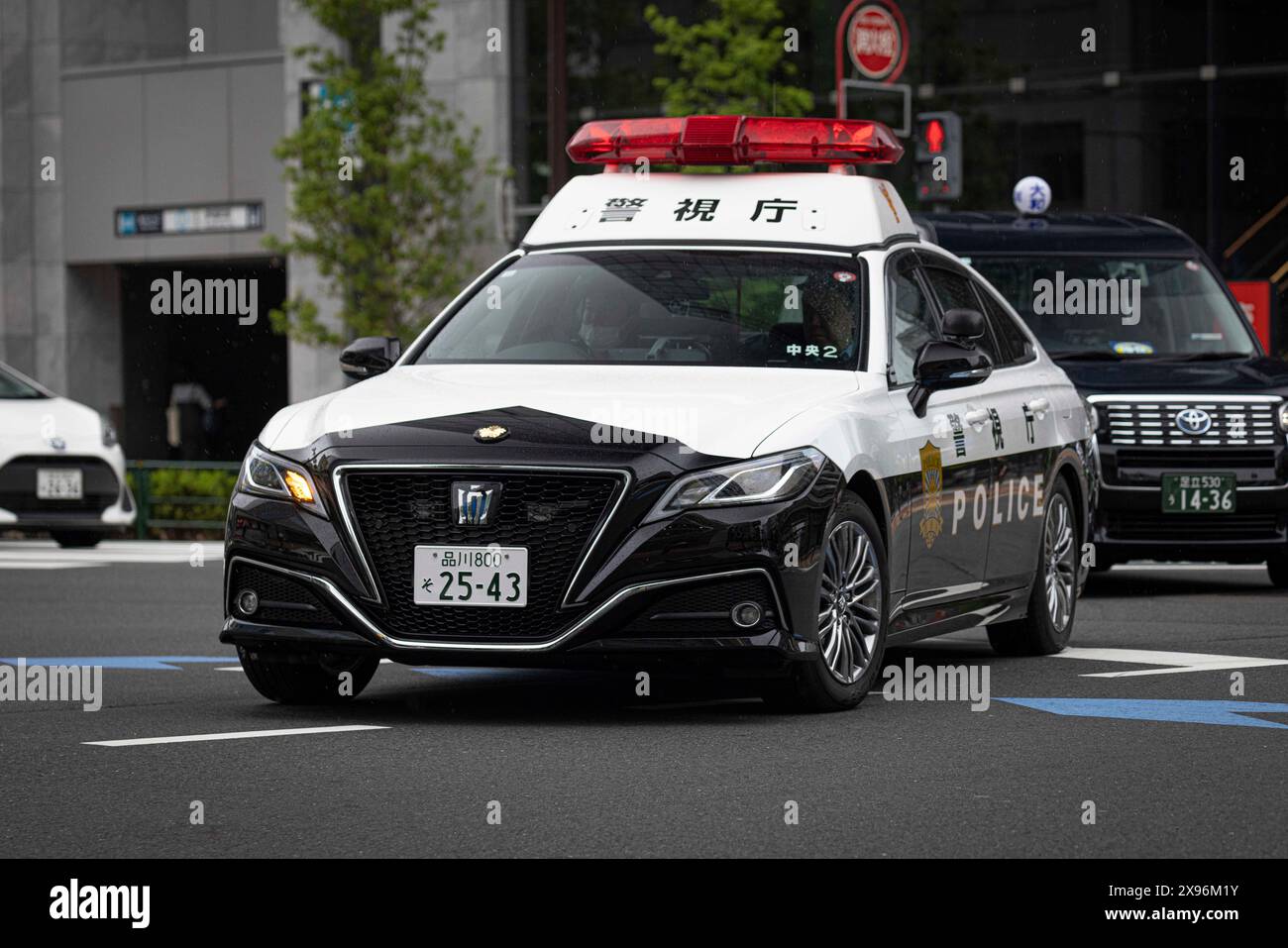 Japanese police car seen moving during duty Stock Photo - Alamy