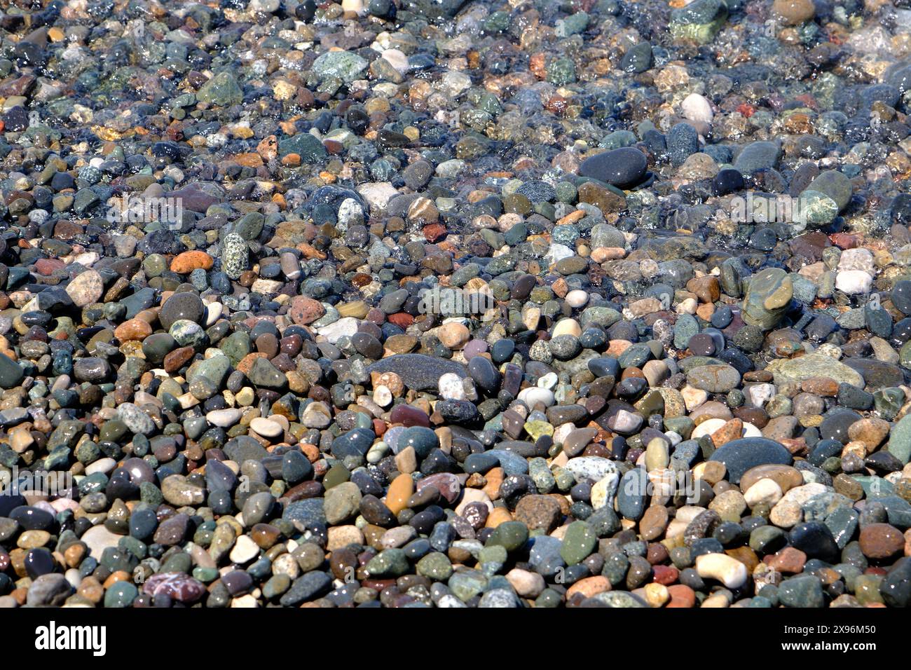 pebbles on the beach. Pebble beach background Stock Photo - Alamy