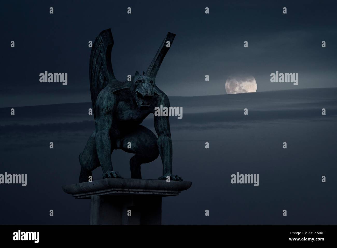 Guardian statue with full moon in Valencia (Spain Stock Photo - Alamy