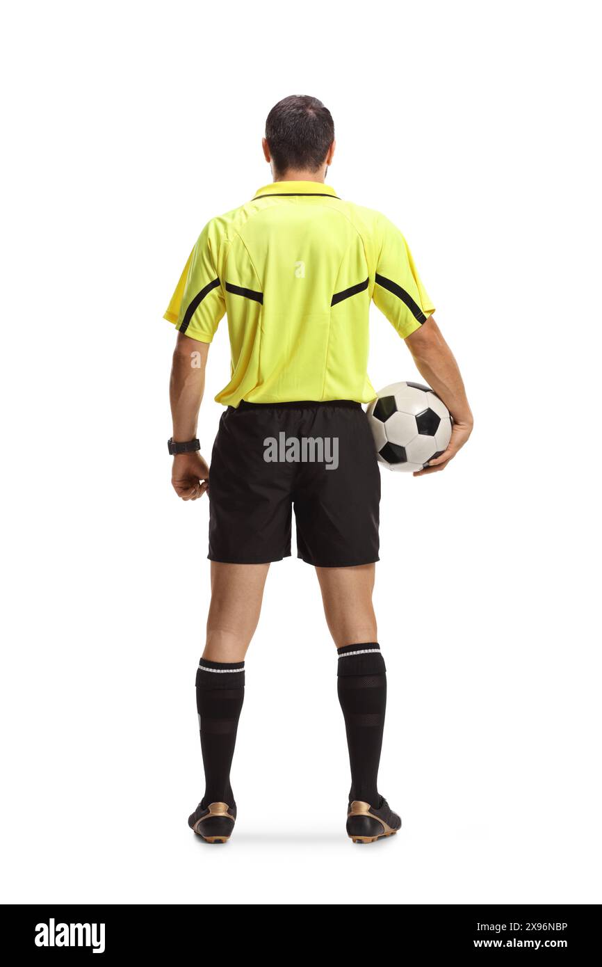 Rear view shot of a football referee holding a ball isolated on white ...
