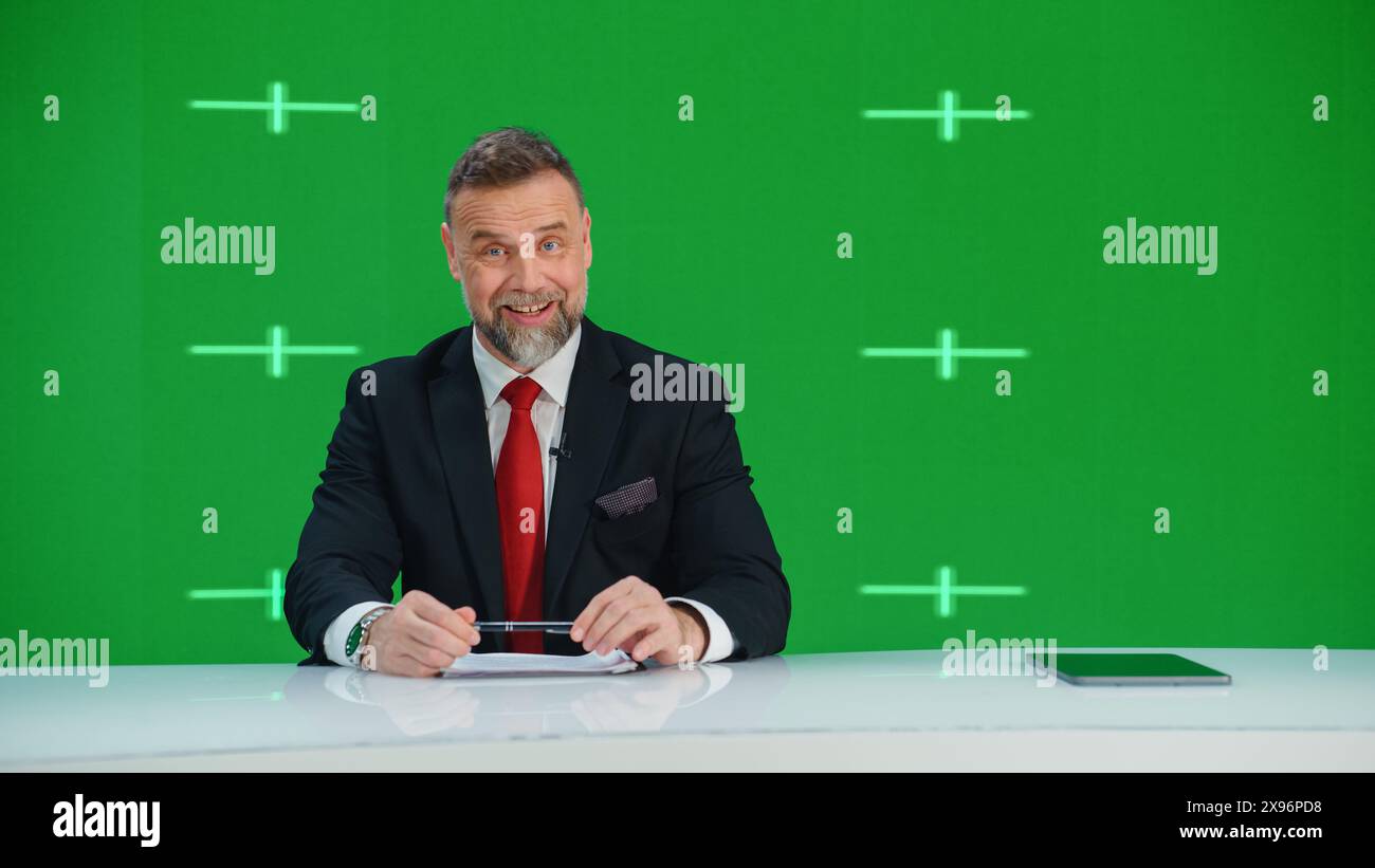 Newsroom TV Studio Live News Program with Green Screen Background: Male ...